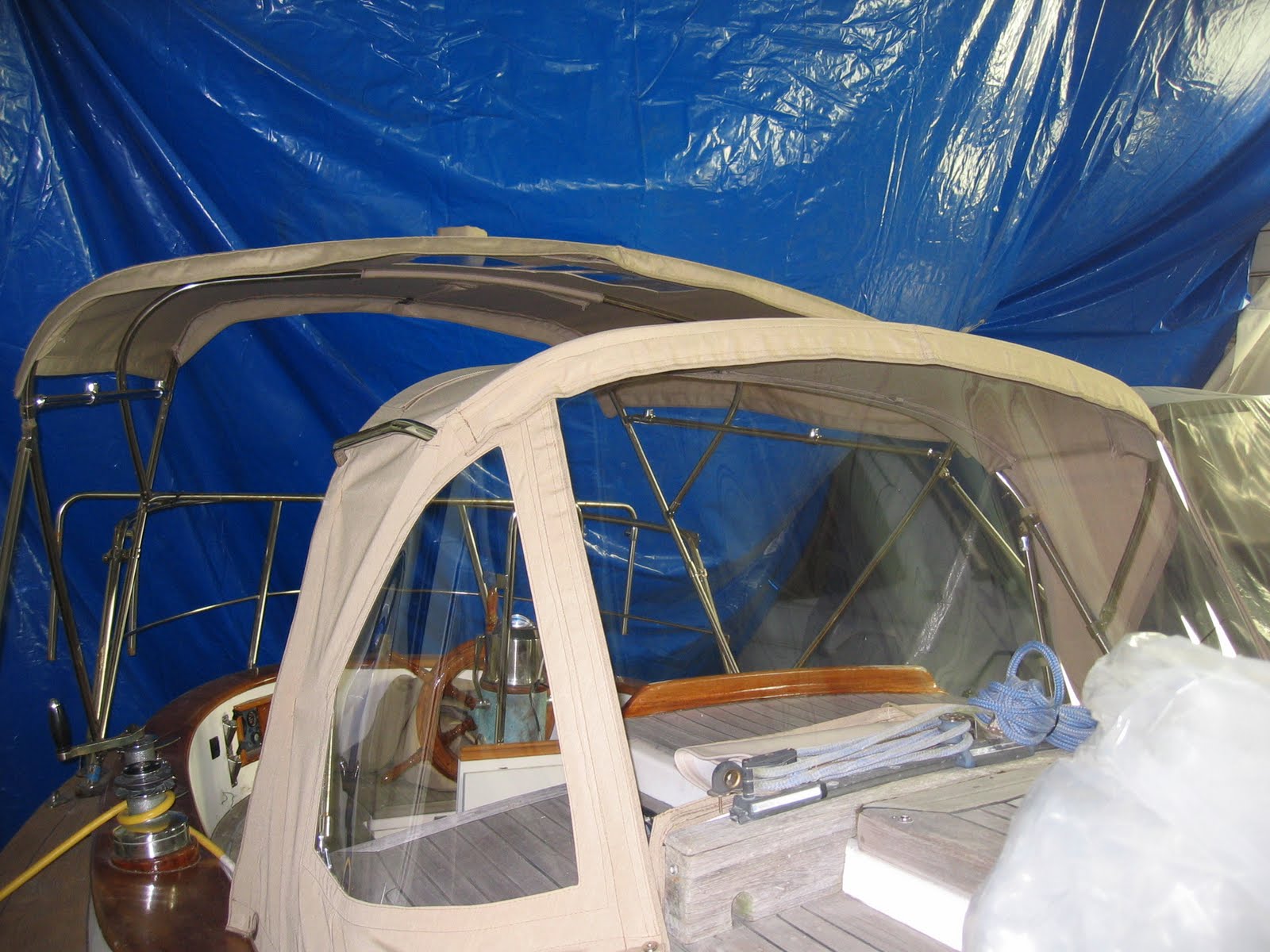 Homestyle Custom Upholstery and Awning: Tan Boat Tops