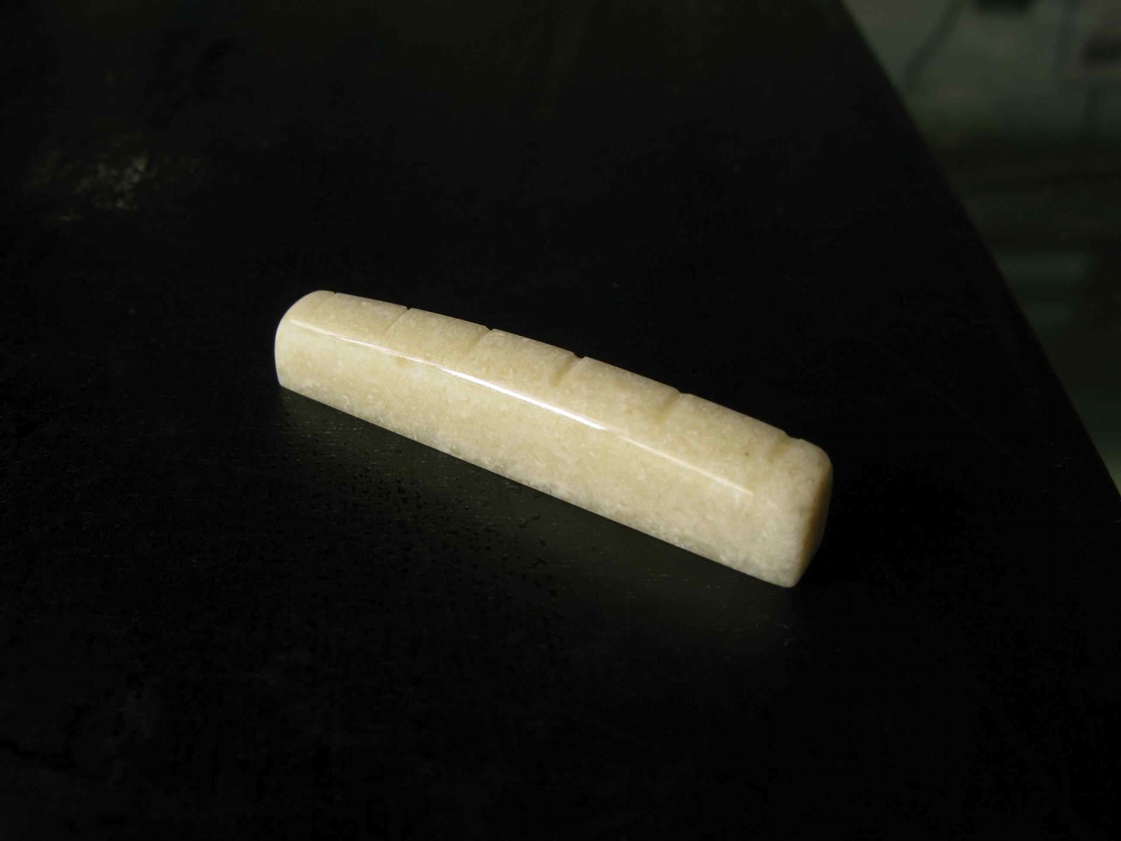 Guitaring Passionately: Saddle Materials For Guitars Part 2