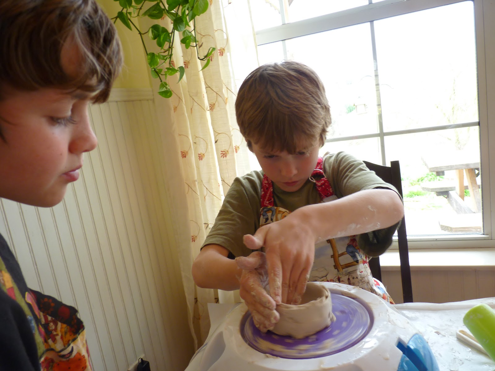 At the Butterfly Ball: Throwing Clay