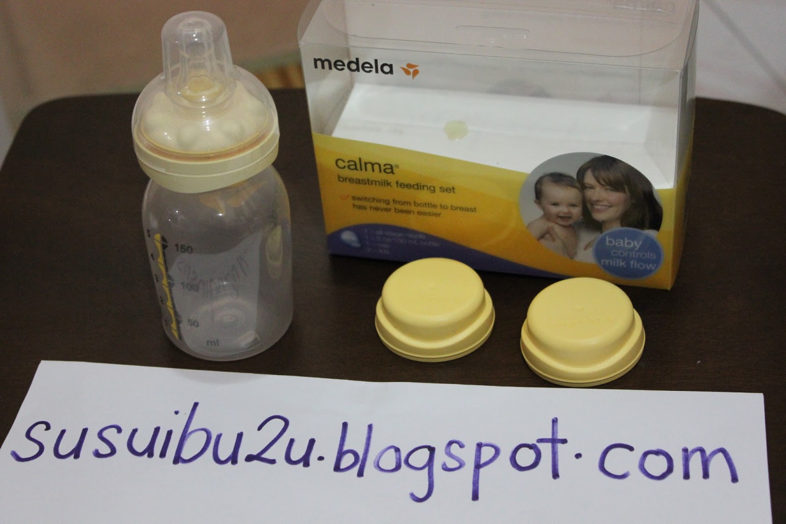 Susu Ibu , Breastfeeding dan Breast Pumps: Medela Calma With Bottle RM100