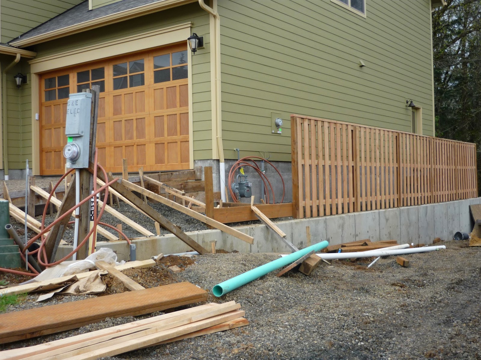 Sparrow Hill House Project: Front Porch, Fence, and Uphill Retaining Wall