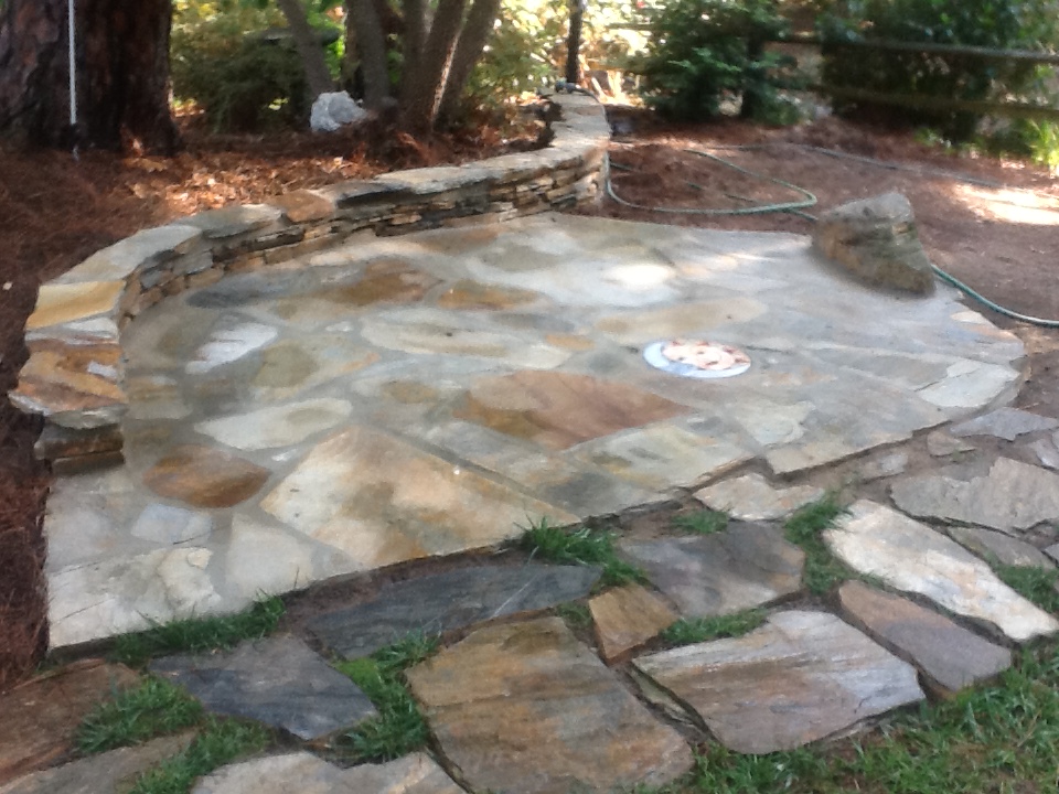 Flagstone Patio With Grass Joints - all in one patio design