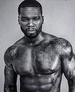50 Cent shows off his toned body