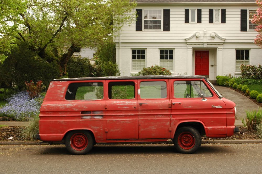 OLD PARKED CARS.: 1964 Chevrolet Corvair Greenbrier Sportswagon.