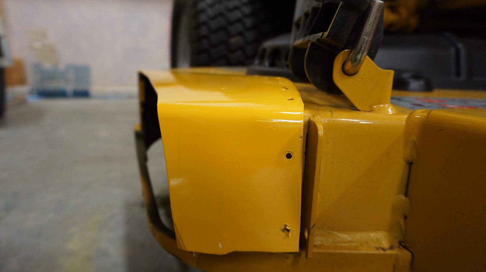 Big Dog Alpha / Hustler Raptor Deck Discharge Chute Modifications.