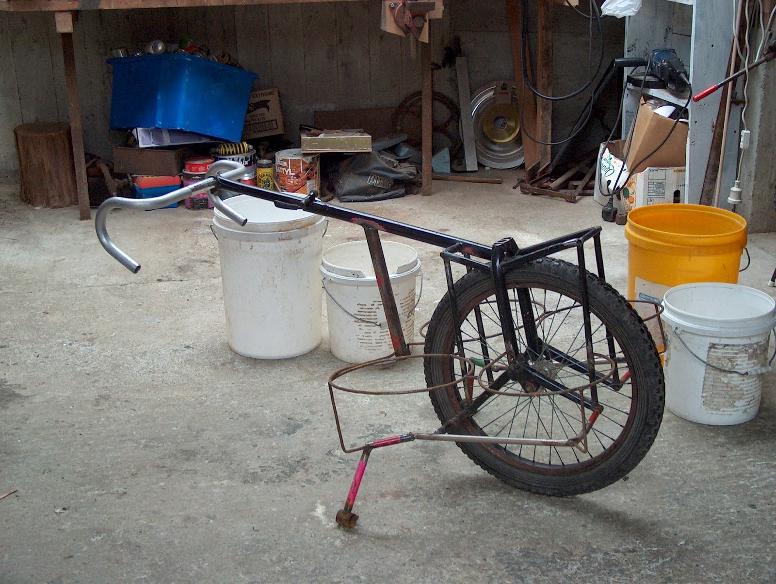 colonial diaspora: Weeding barrow