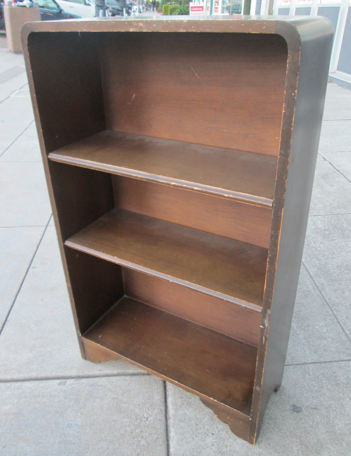 UHURU FURNITURE & COLLECTIBLES: SOLD Dark Rounded Edge Bookcase - $30