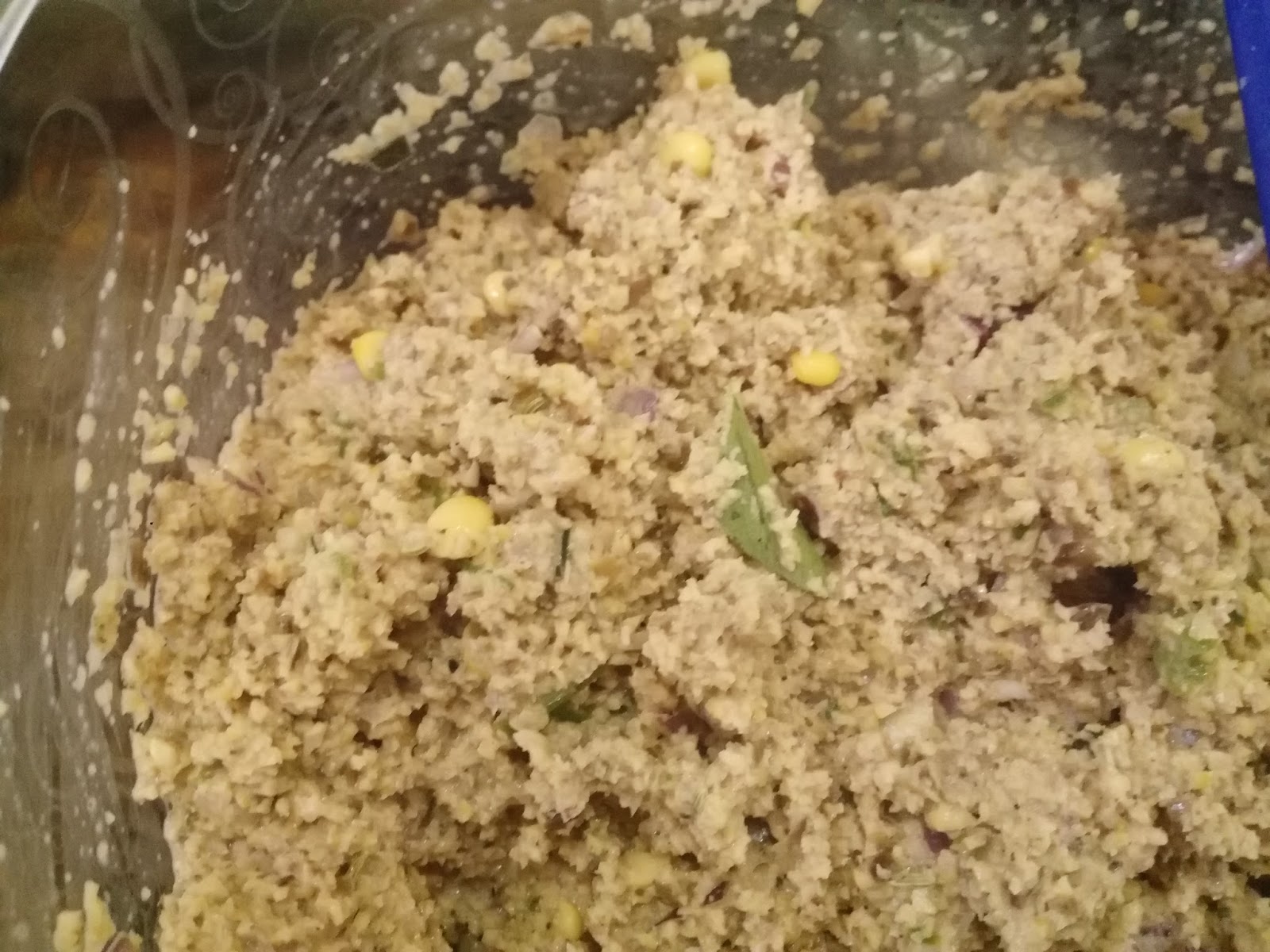 Check for the salt after mixing.Take a spoon and pick the vada batter ...