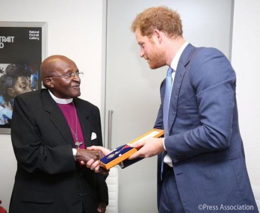 Photos: Prince Harry meets Desmond Tutu, confers the Queen's 'Companion ...