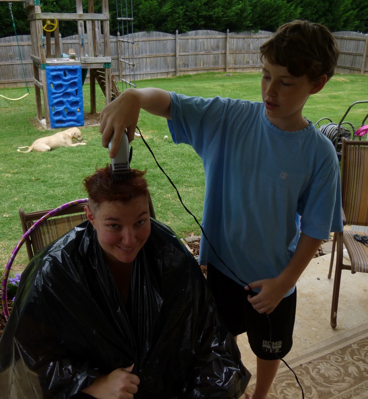 Family fun... shaving mom's head!