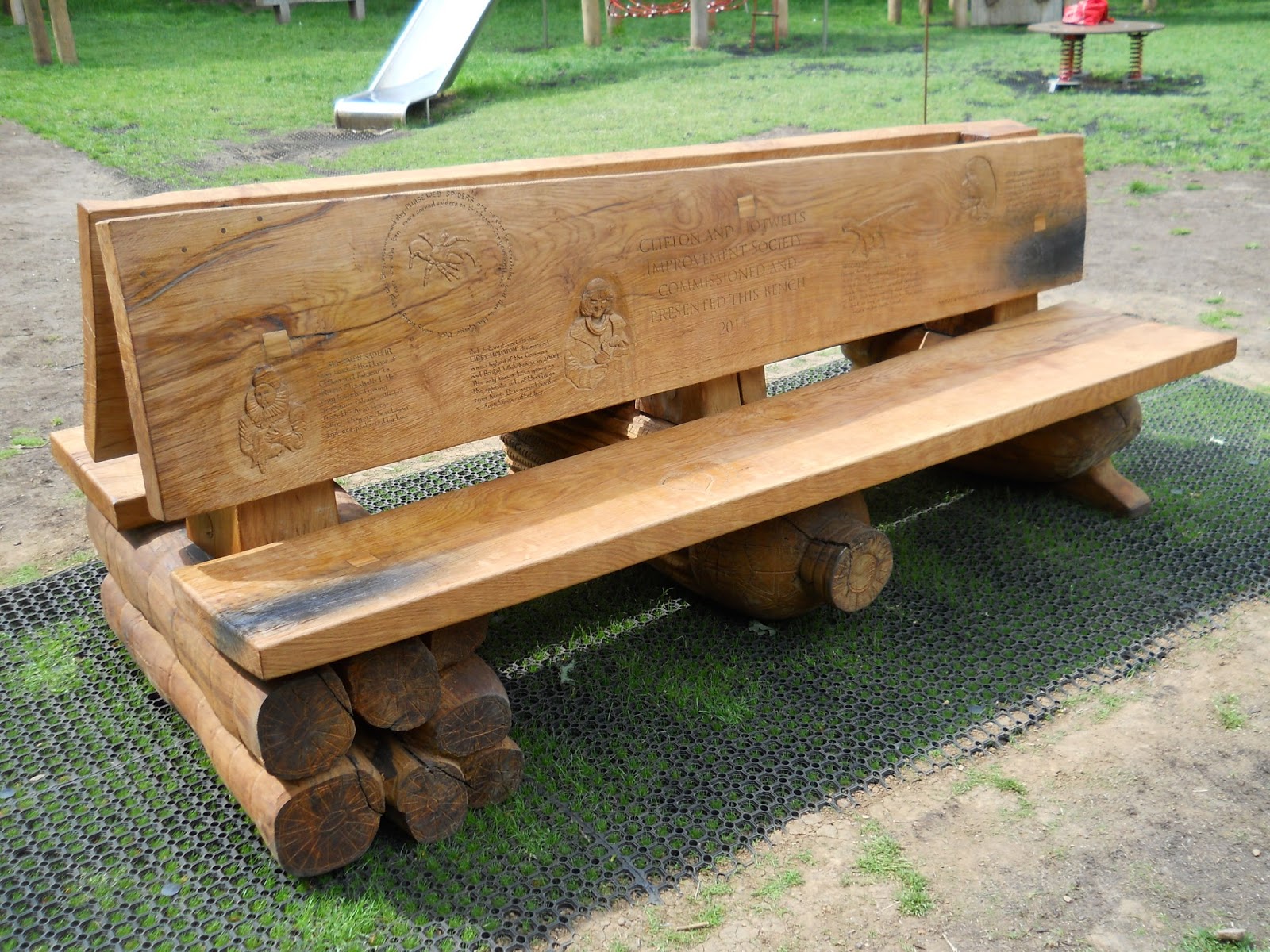 Where are the carved spiders hidden on the bench in the children's ...