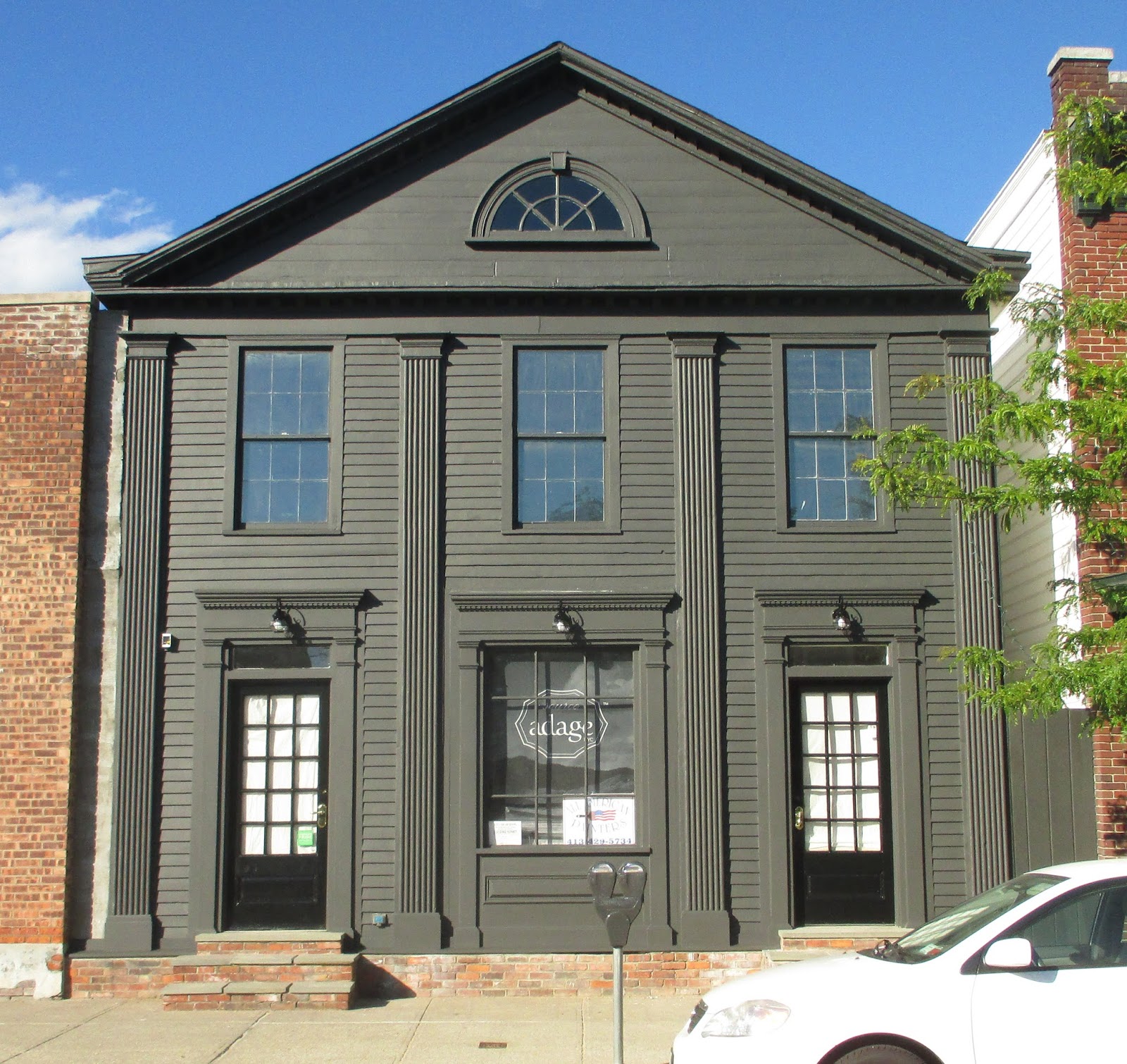 The Gossips of Rivertown: The Evolution of a Building