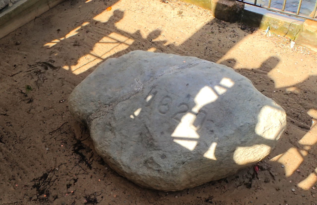 With Water Below: An Ordinary Rock