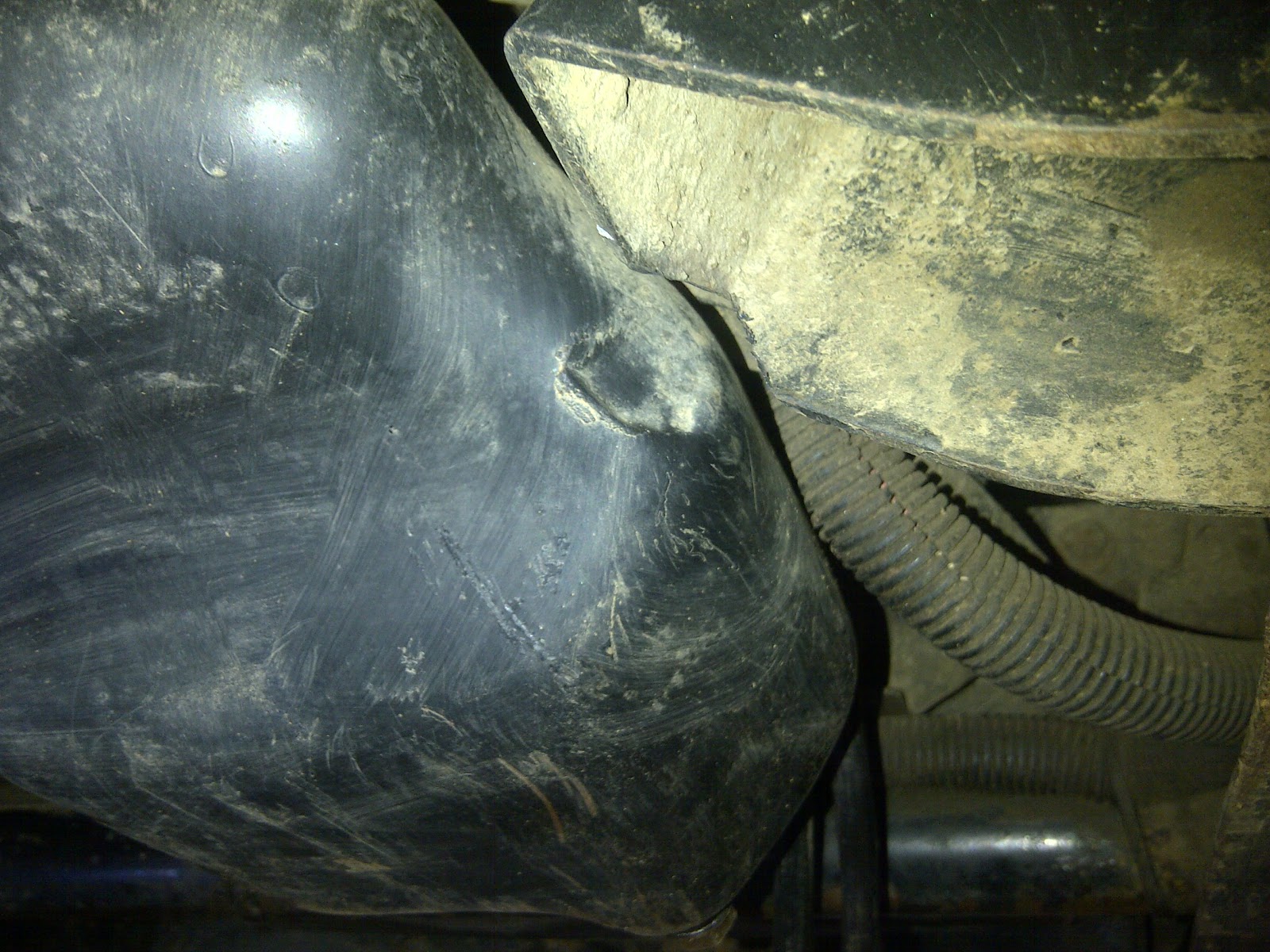 Bobs Shop: Cushman dented oil pan