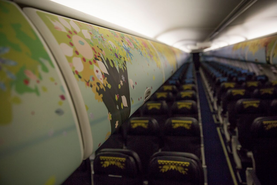 WestJet's Disney Frozen themed plane - Disney magic inside and out ...
