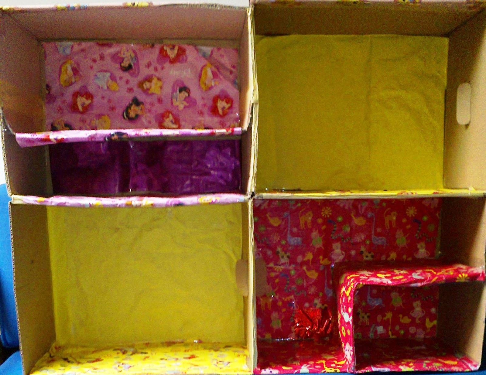 The Stepford wife: Cardboard boxes as a toy cupboard