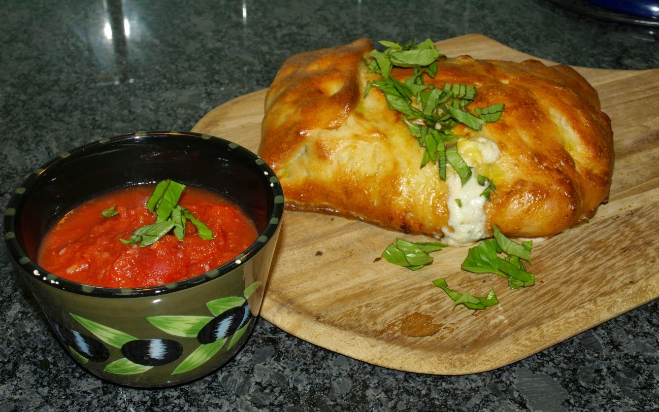 Cooking the Smitten Kitchen: Eggplant and Three Cheese Calzone (p. 111)