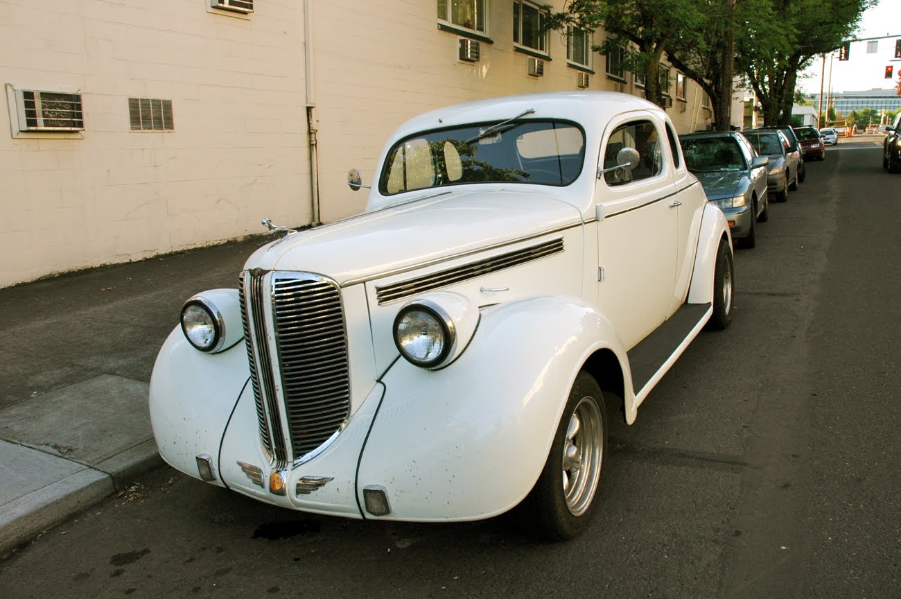 OLD PARKED CARS.: 1938 Dodge Brothers Business Coupe.