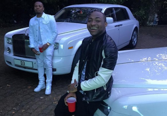 NIGERIAN TOP SECRET: See Olamide Looking So Frosh On A New Rolls Royce