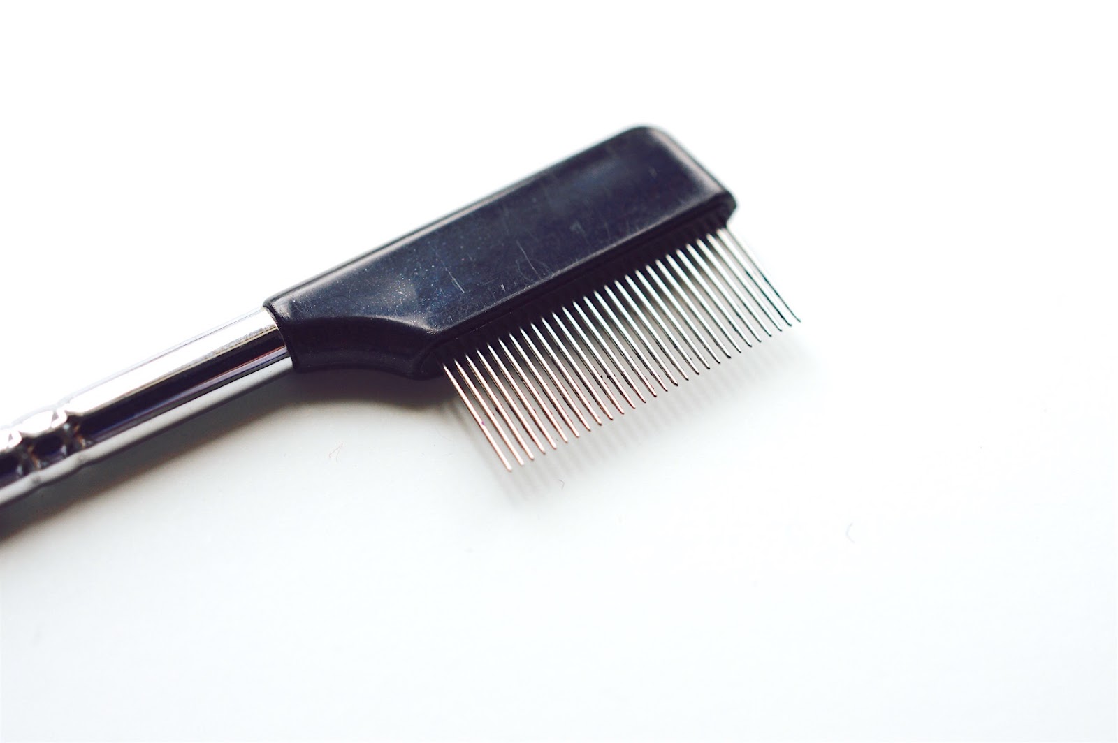 metal lash comb