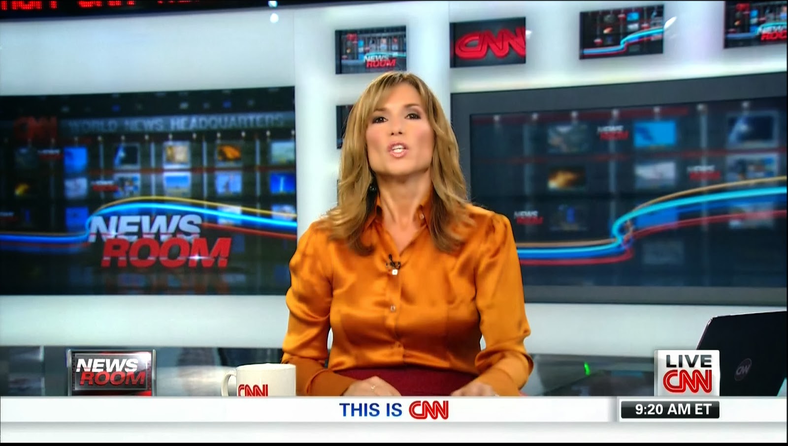 Ladies in Satin Blouses: Carol Costello - orange satin blouse