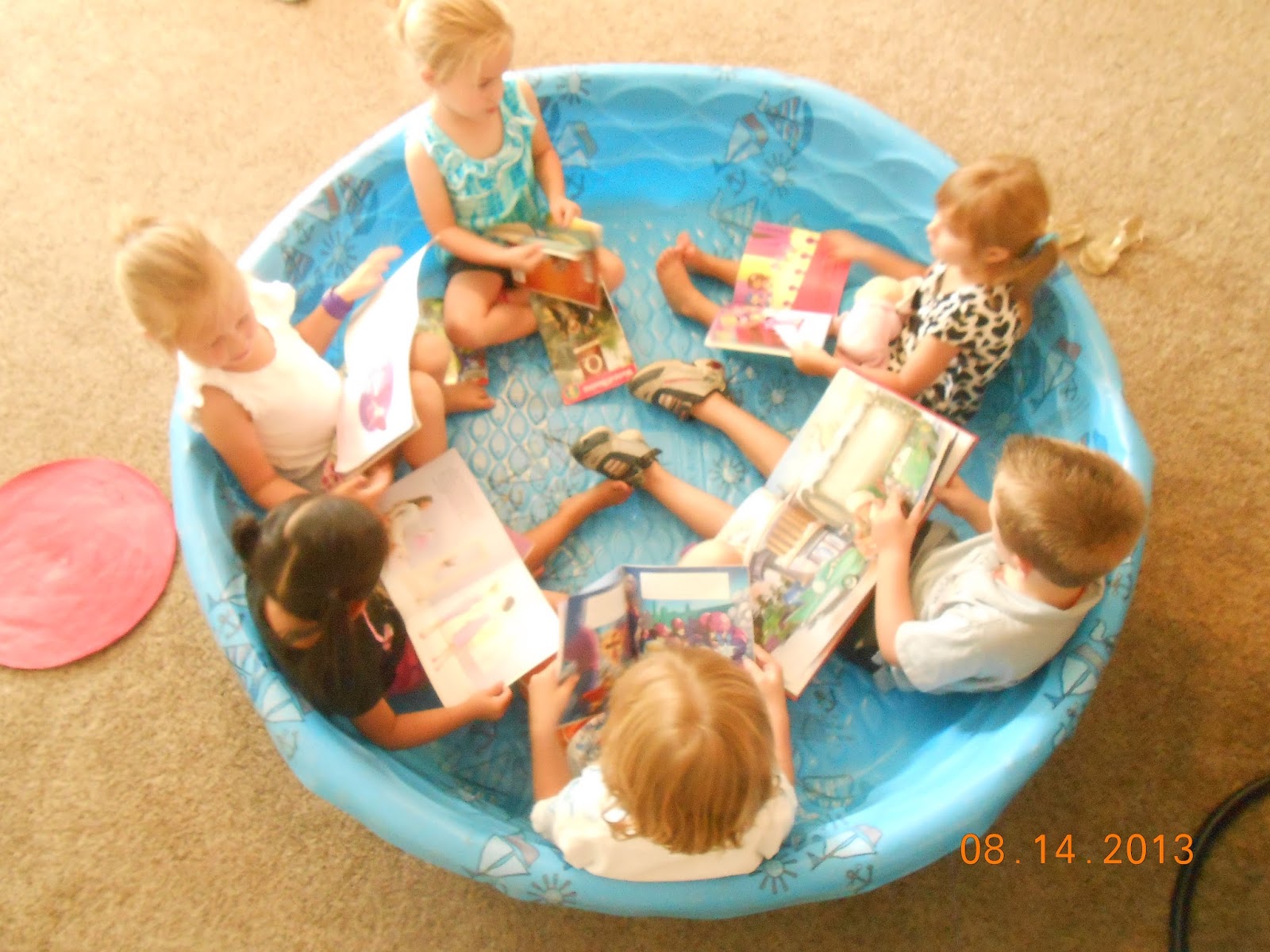 CHILDREN’S CAMPUS: Reading our library books in the ocean