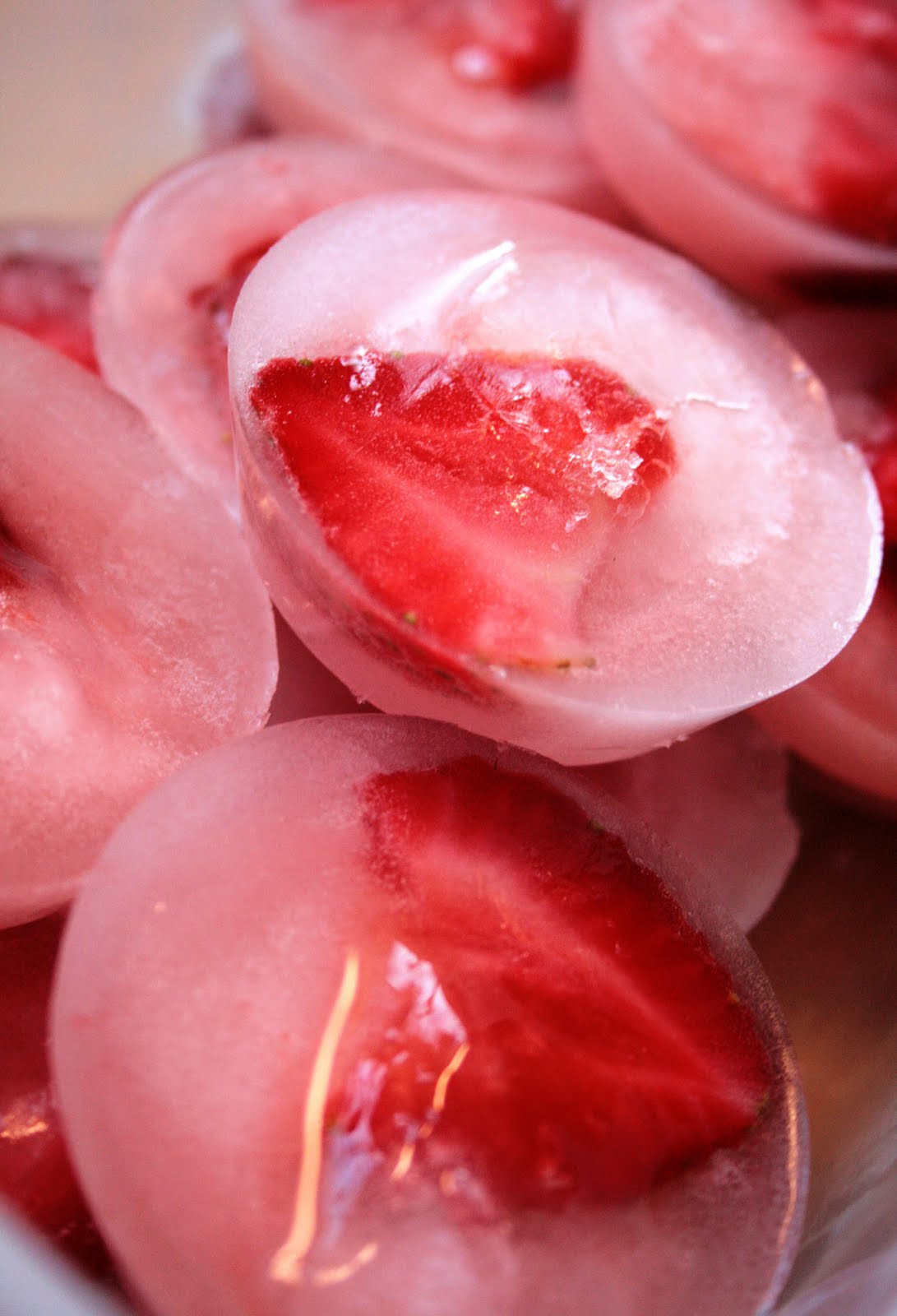 *kimw*: Heart-shaped-strawberry-pink-ice cubes.