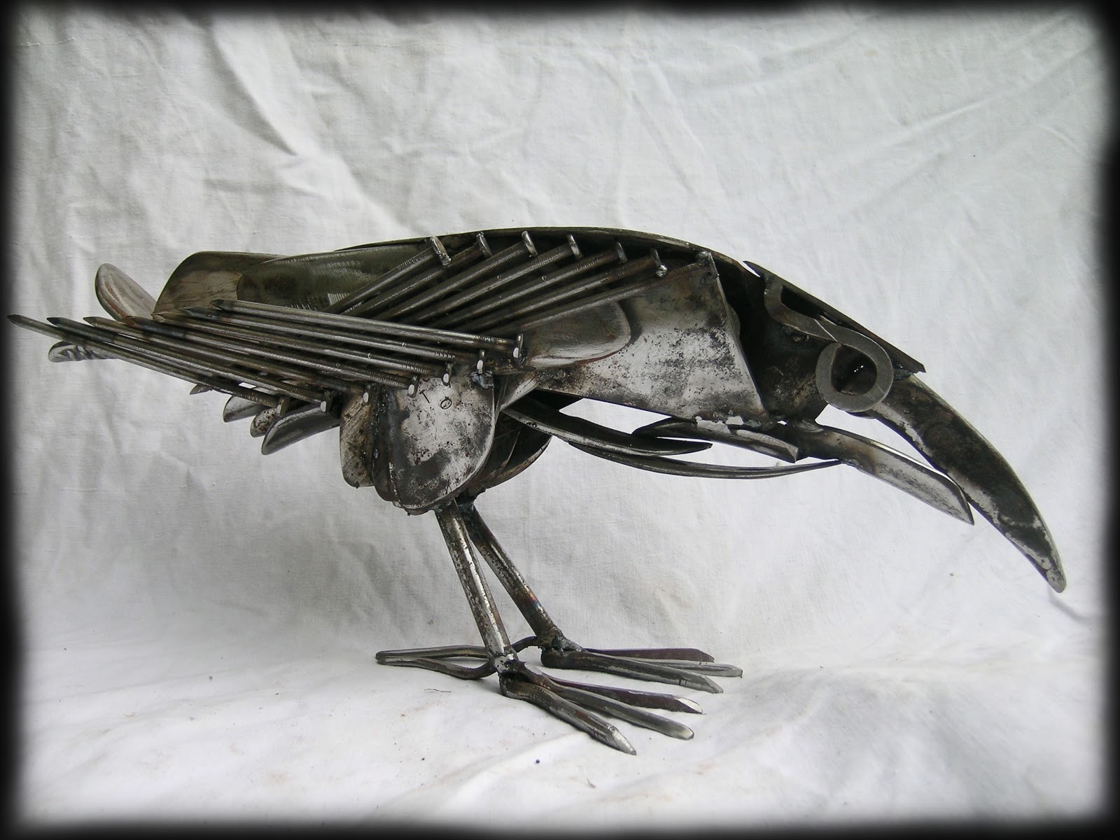 Yanos: "Corbeau II" métal 60x30x20