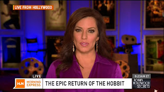 Ladies in Satin Blouses: Robin Meade - purple satin blouse