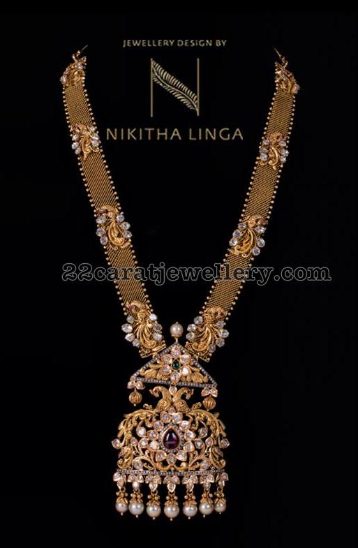 Antique Peacock Long Chain by Nikitha Linga - Jewellery Designs
