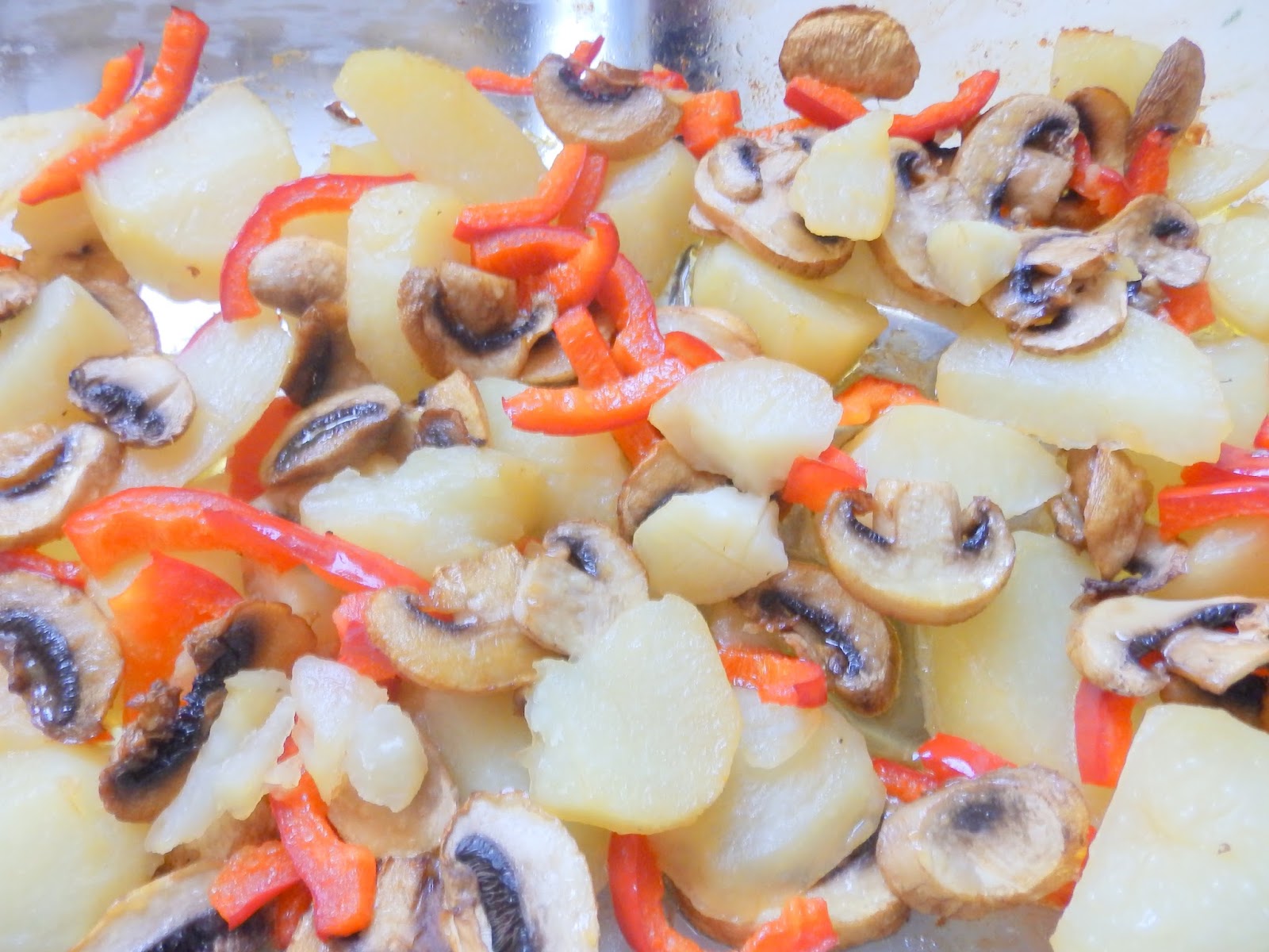 Rèmol amb patates i xampinyons al forn