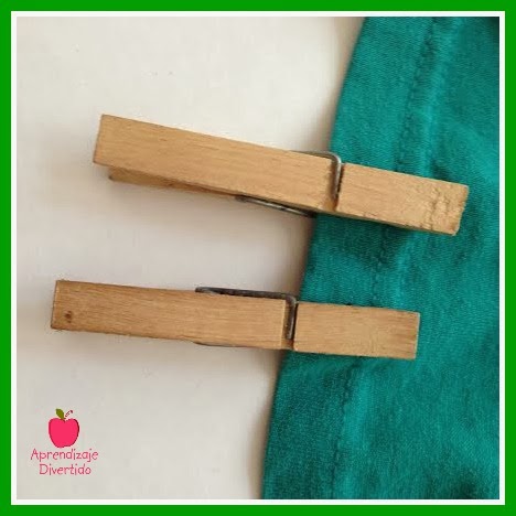 Pinches de ropa: Ofrécele un pedazo de tela o cordón y pídele que ...