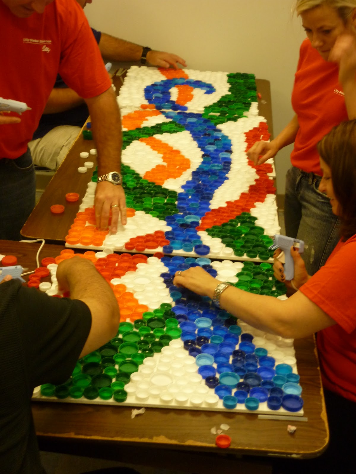 Sense of Wonder: Lilly Employees Create Bottle Cap Mural!