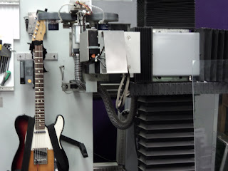 Twelve Guitars: THE PLEK MACHINE IN NORMAN, OKLAHOMA