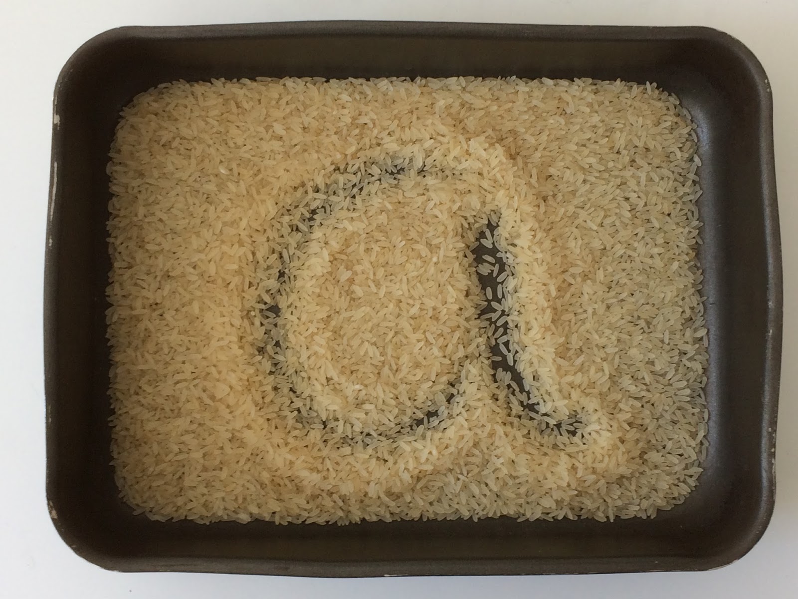 Family FECS: Montessori Activity: Letter Rice Tray