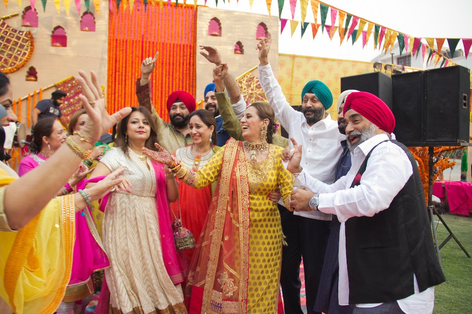 Orange and Pinkk: Vibrant Mehendi by Simran Jagdev