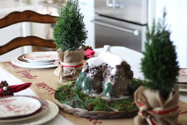 A Nature Inspired Christmas Tablescape Featuring Plaid, Pines, and Burlap