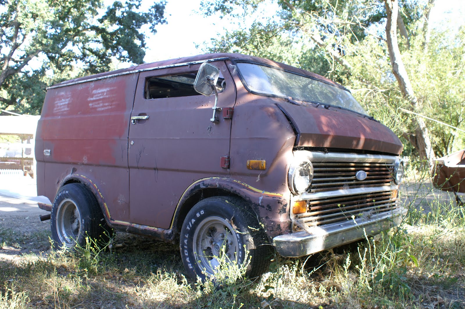 IN RUST WE TRUST: Rusty chopped van