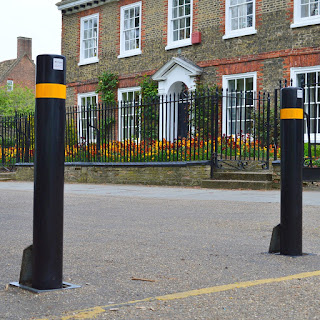 Barricade Fabrications: Telescopic retractable security posts.