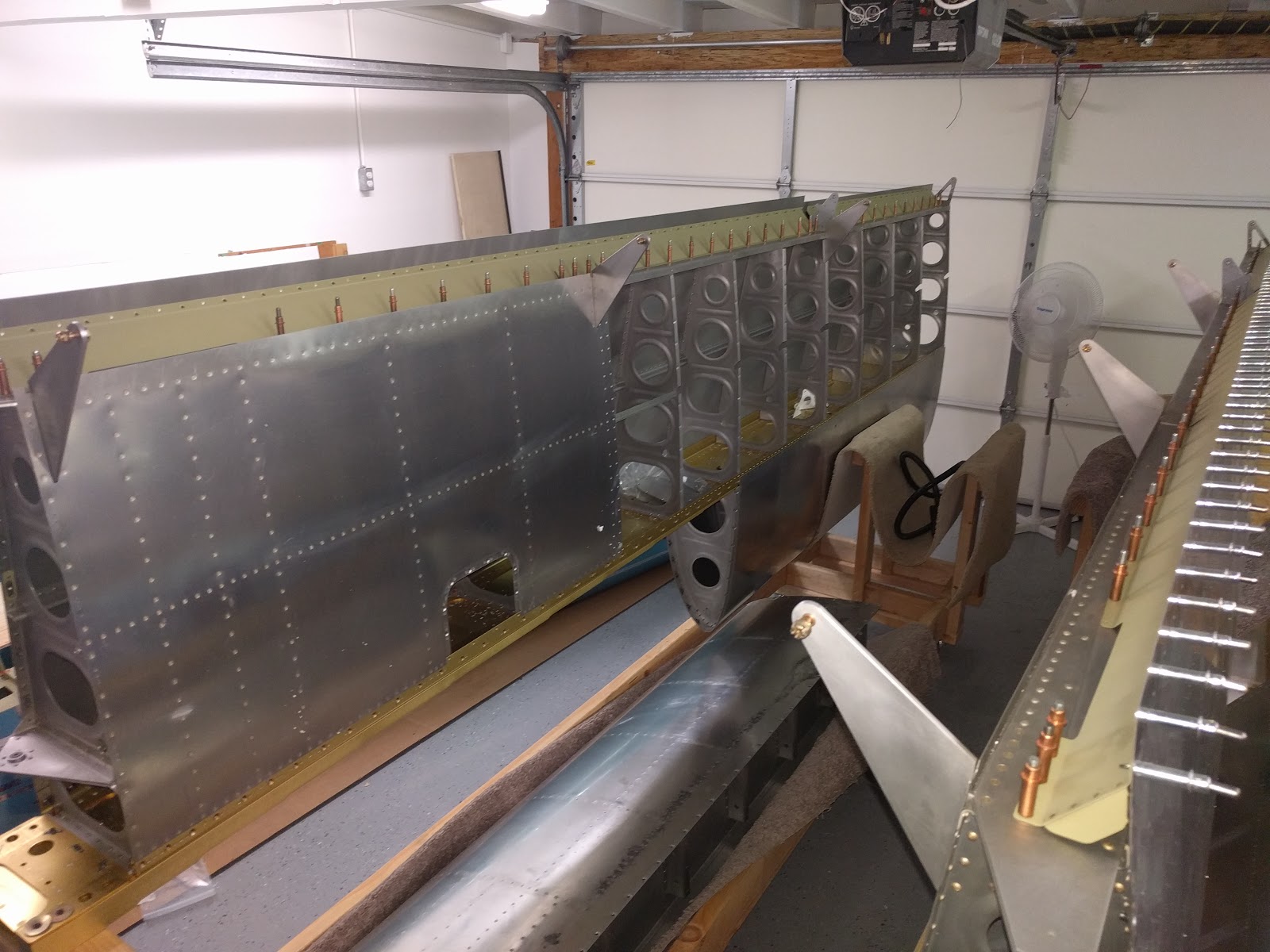 Damazio family's RV-10 project: Bottom wing skins started