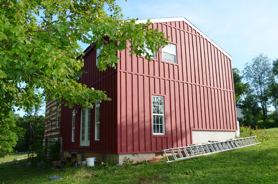 board and batten painted red | Shed roof design, Exterior house remodel ...