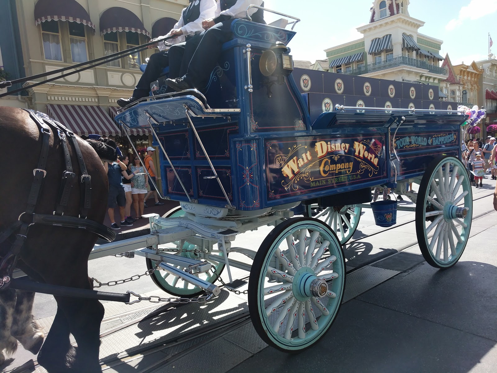 Horse-Drawn Blue Carriage On Main Street USA