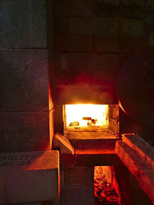 Firing a reconstructed wood fired kiln.
