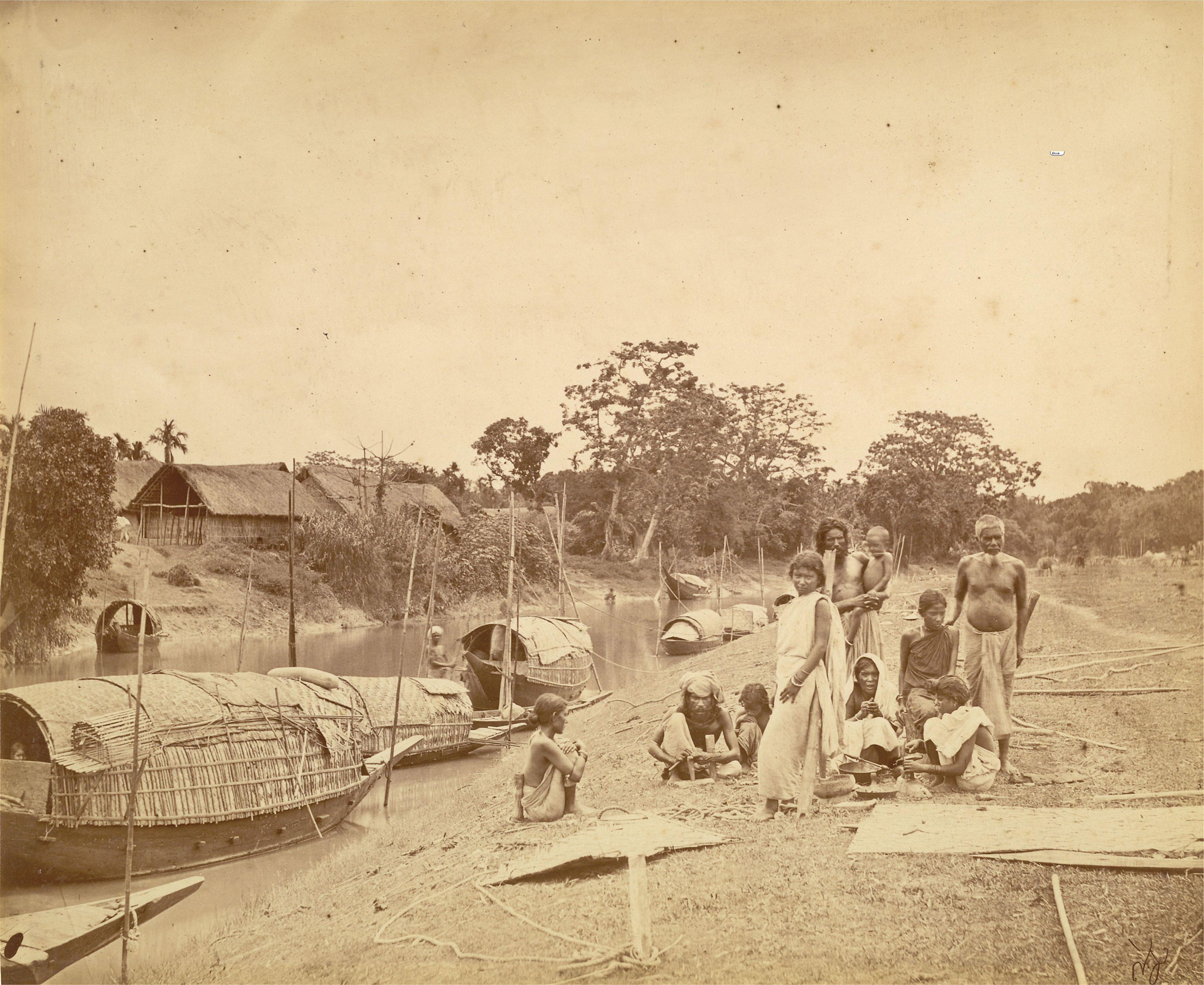 A Family on Riverside with Boats and Village in the background ...