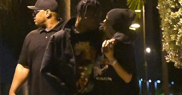 Photos: Travis Scott wraps his arm around Kylie Jenner during romantic ...