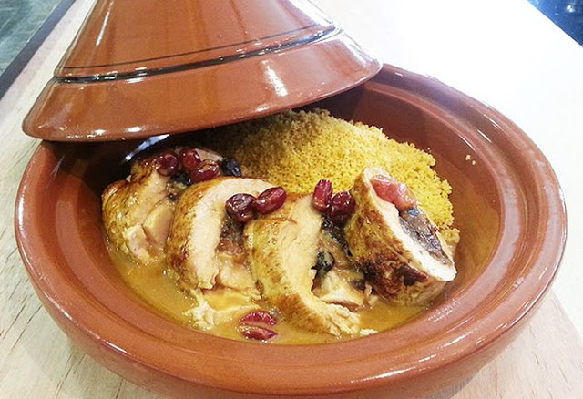 Middle Eastern turkey tagine with carrot couscous and rose petals ...