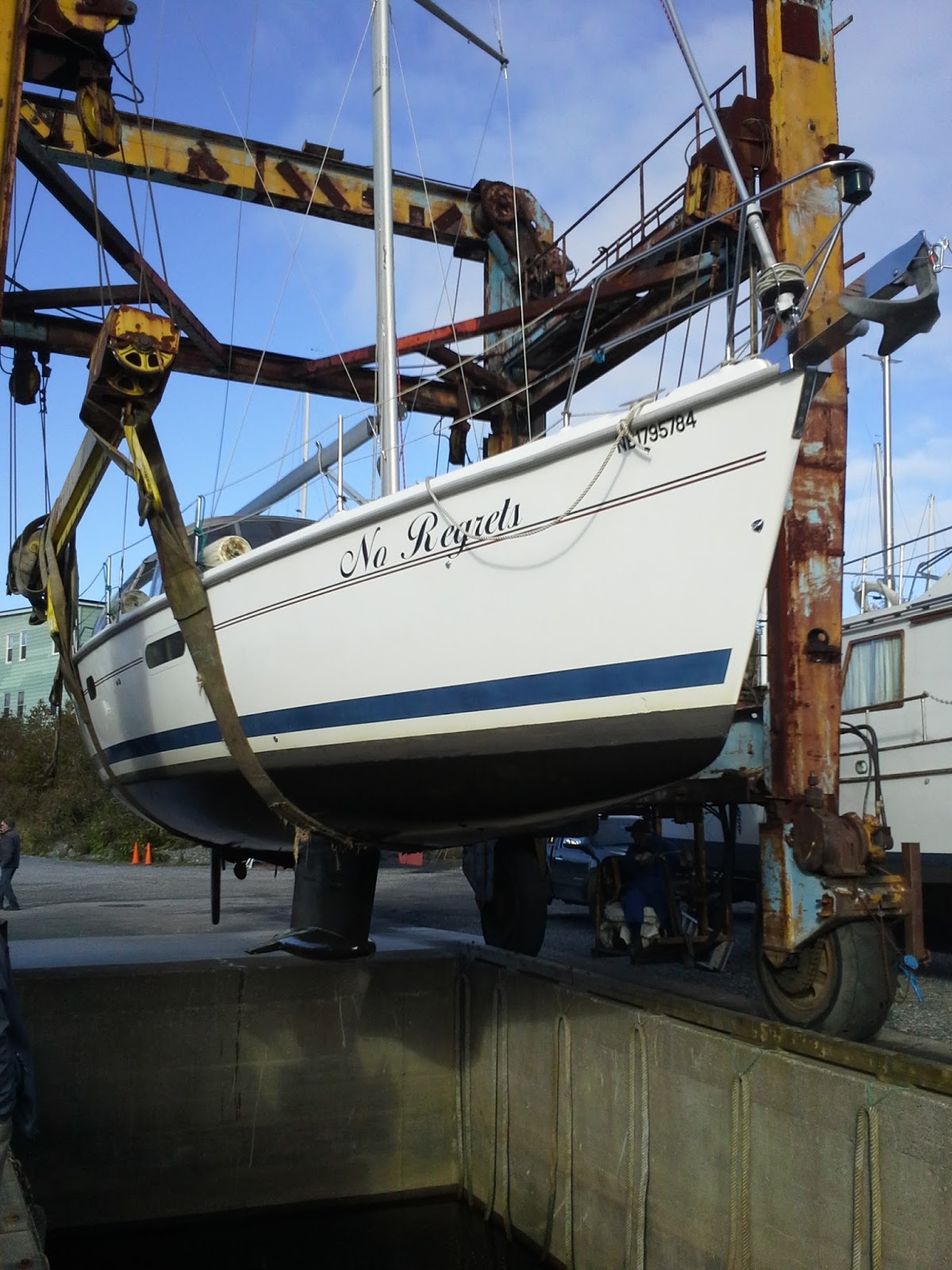 SUMMER-SAILING: Lifting the boat out for the winter season