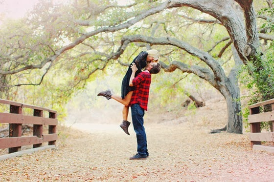 Kiss hug couple lift girl beautiful place like heaven | nineimages