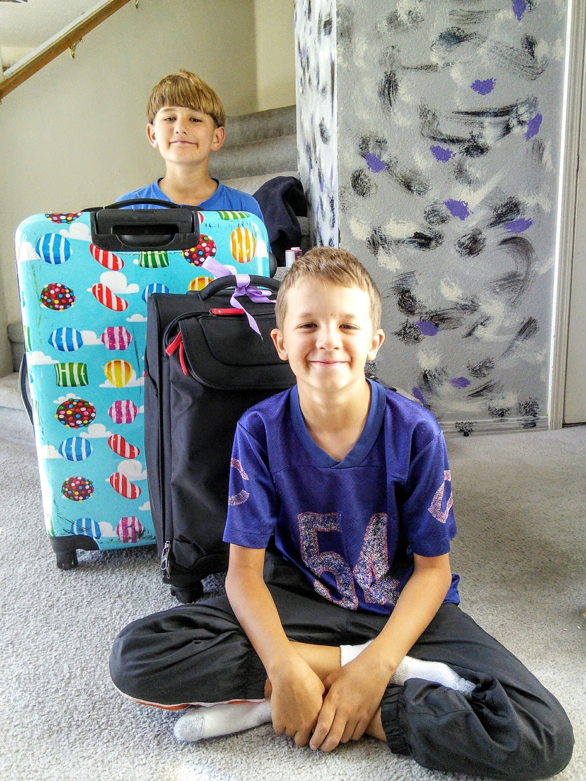 When we travel my younger boys always share a suitcase.
