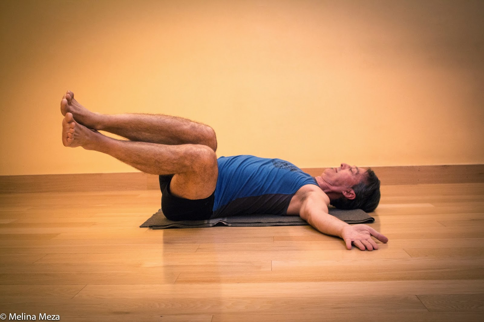 Featured Pose: Reclined Twist ~ multiple fitness
